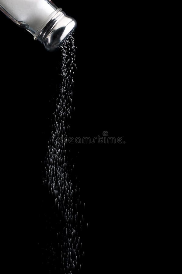 Salt Being Poured from a Salt Shaker Stock Photo - Image of shaker ...