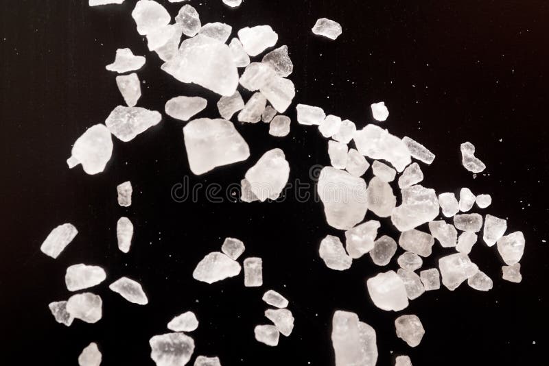 Salt on black stock image. Image of stone, food, space - 204284595