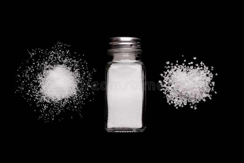 Salt is Poured from a Salt Shaker on a Black Background Stock Image ...
