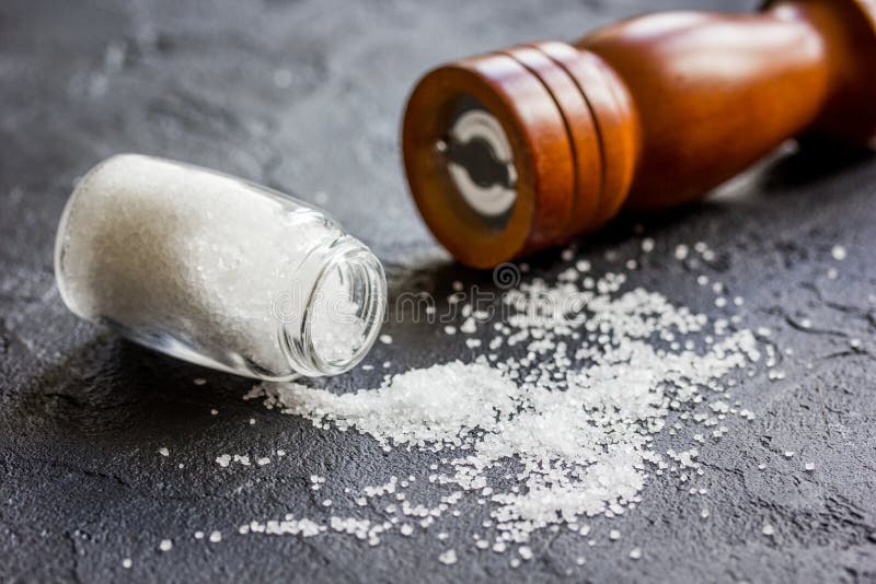 Salt in Bottle with Saltcellar for Spices Set Dark Background Closeup ...