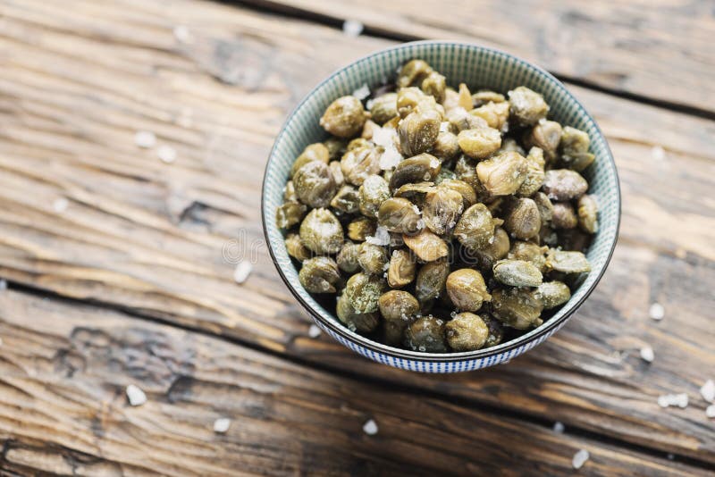 Salt Capers on the Wooden Table Stock Photo - Image of spice, rustic ...