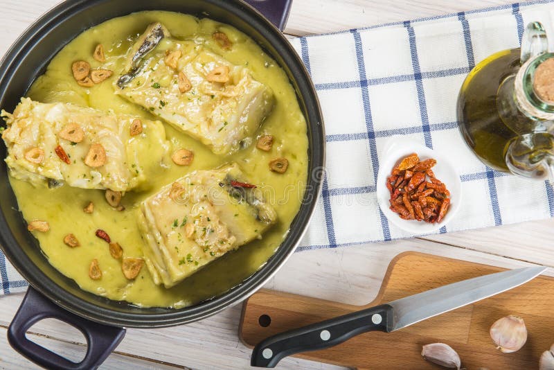 Salt cod in a pilpil sauce stock photo. Image of sauce - 71931430
