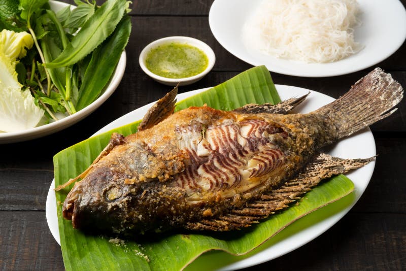 Salt-crusted Grilled Tilapia Fish ,Pla Pao Kluer Stock Image - Image of ...