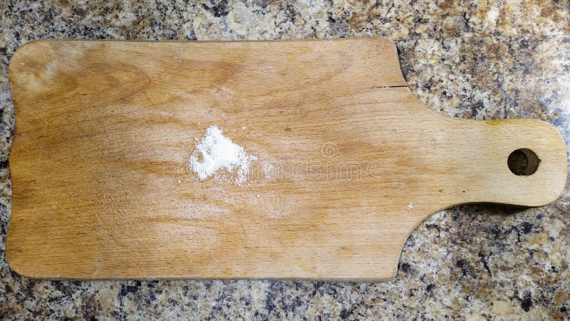 Salt on Cutting Board on Kitchen Table Stock Photo - Image of recipe ...