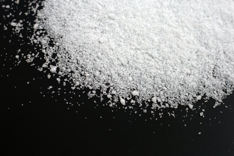Salt on dark background. stock photo. Image of backdrop - 211544270