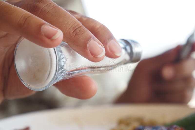 Salt Falls from a Salt Shaker Stock Photo - Image of powder, falling ...