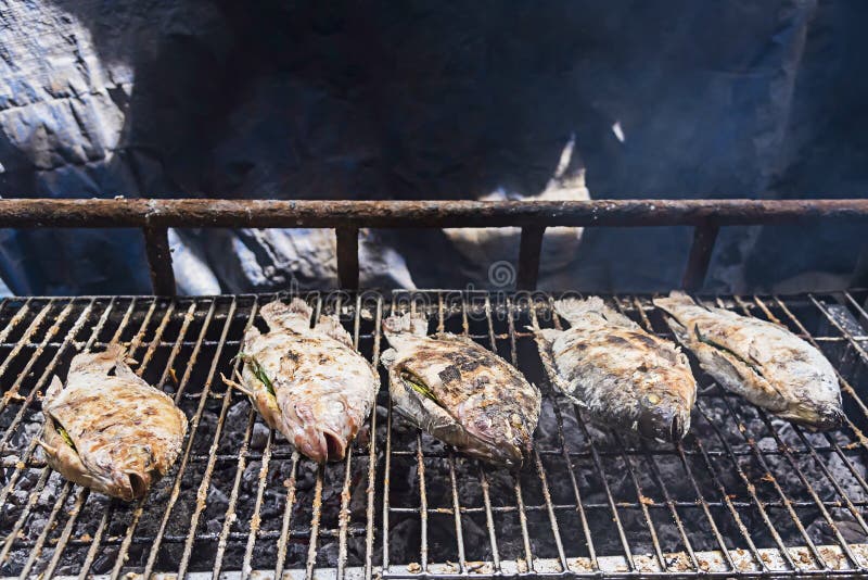 Salt Grilled Fish on the Coals is a Traditional Thai Dishish Stock ...
