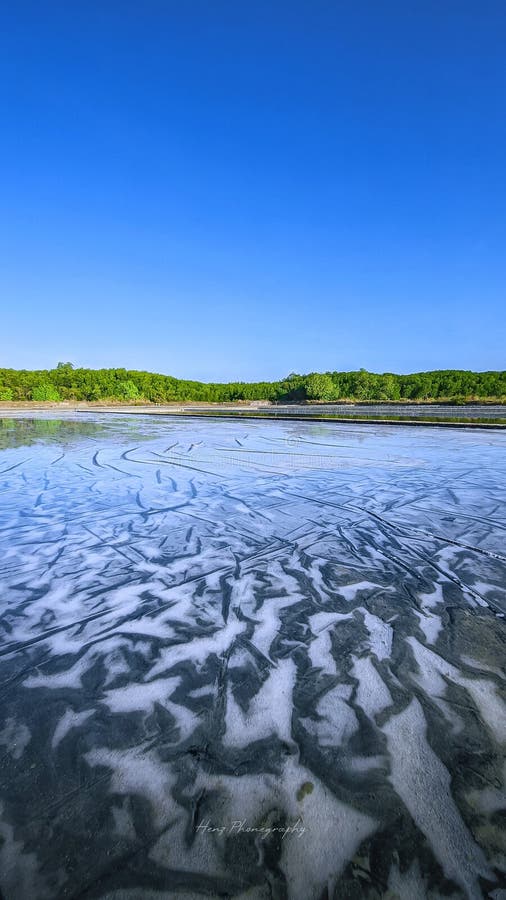 Salt making process stock image. Image of salt, ponds - 243794435