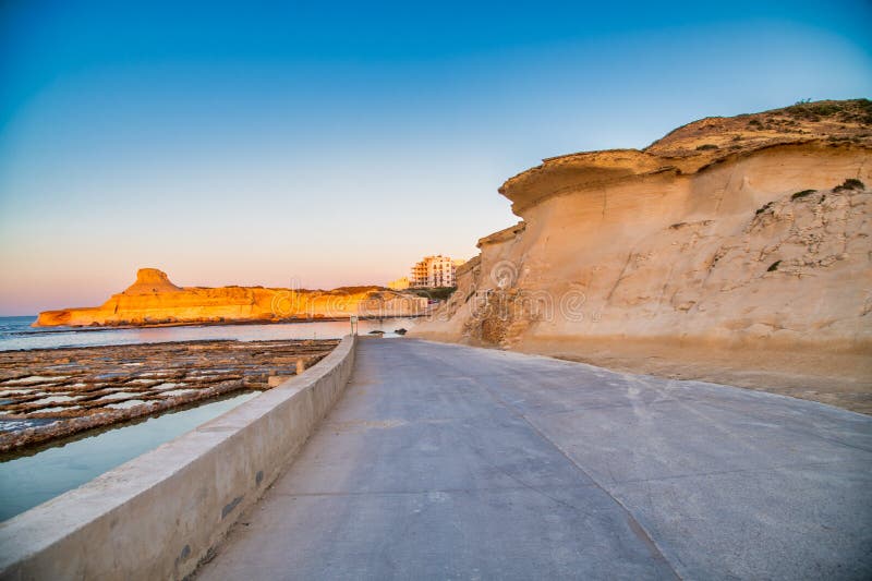 Salt Pans in Zebbug, Gozo, Road at Sunset Stock Photo - Image of point ...