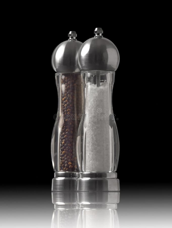 Salt and Pepper Shakers on Reflecting Background Stock Image - Image of ...