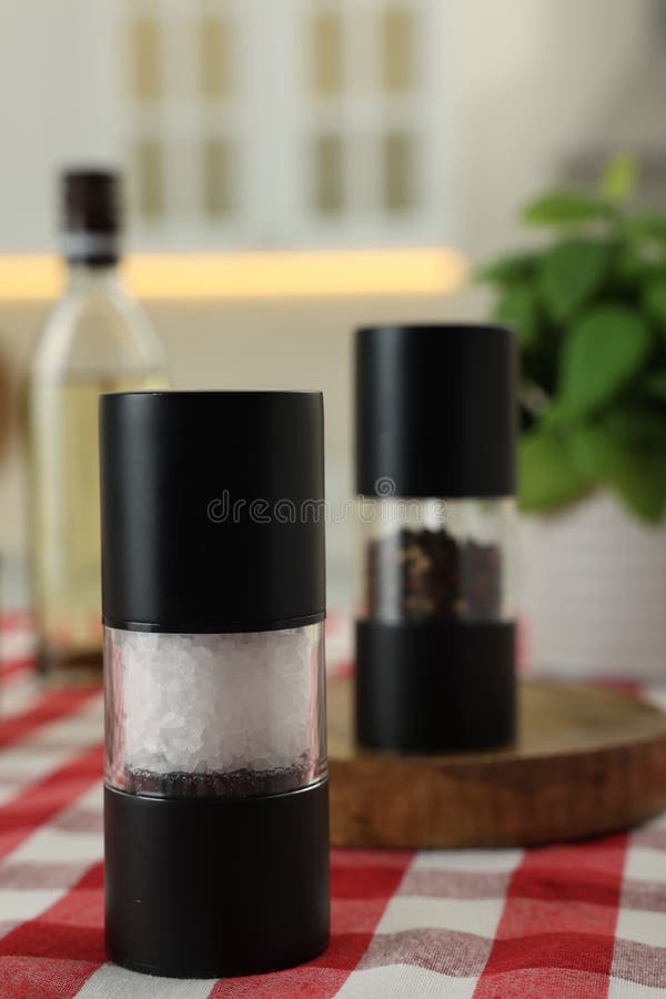 Salt and Pepper Shakers on Table Indoors Stock Photo - Image of ...