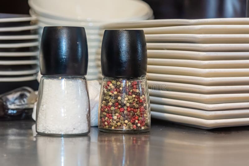 Salt and Pepper Shakers on the Table in a Restaurant Stock Photo ...
