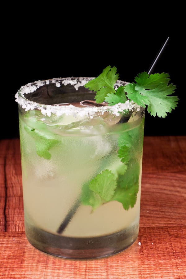 Salt rim margarita glass stock image. Image of garnish - 28958265