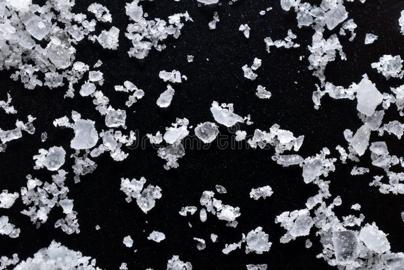 Salt Scattering of Transparent Crystals on a Dark Background. Stock ...