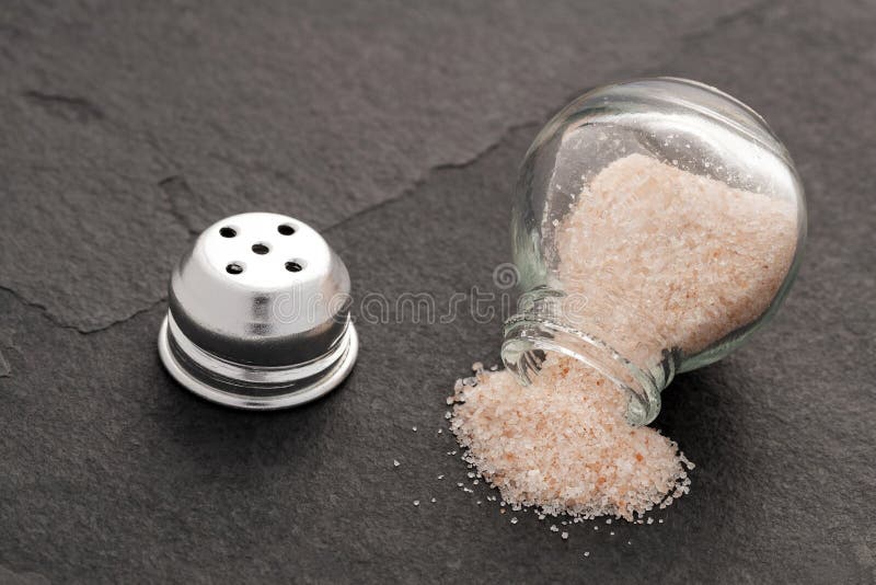 Salt Shaker with Fine Grains of Pink Himalayan Salt Stock Photo - Image ...