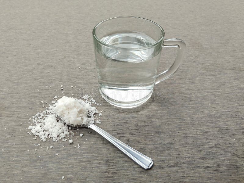 Salt Water Solution in Glass on the Table Stock Photo - Image of ...