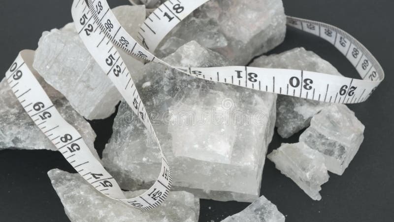 Salt and Weight Gain, Large Pieces of Salt and Tape Measure Stock Video ...