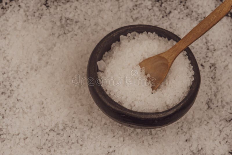 Salt in a Wooden Spoon on the Table. Stock Photo - Image of table ...