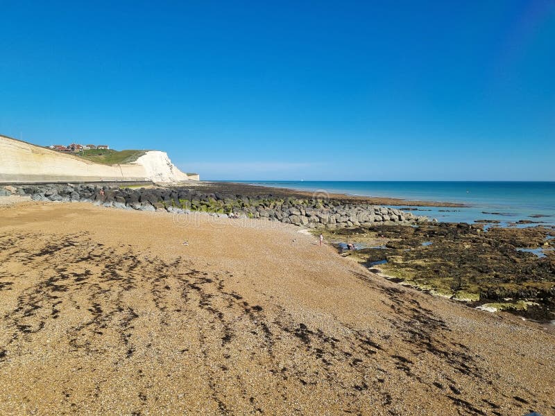 Saltdean Pebble Beach at Low Tide with White Cliffs, South England ...