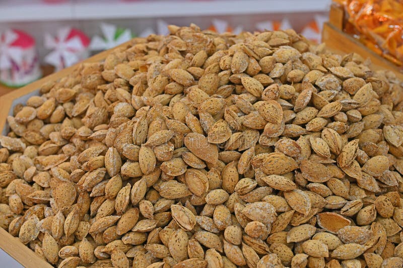 Salted Almonds in Their Shells at the Market Stall Stock Photo - Image ...