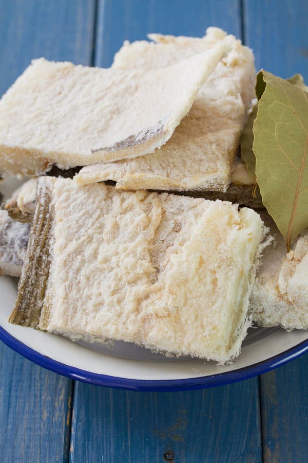 Salted Cod Fish on Dish on Blue Background Stock Photo - Image of dish ...