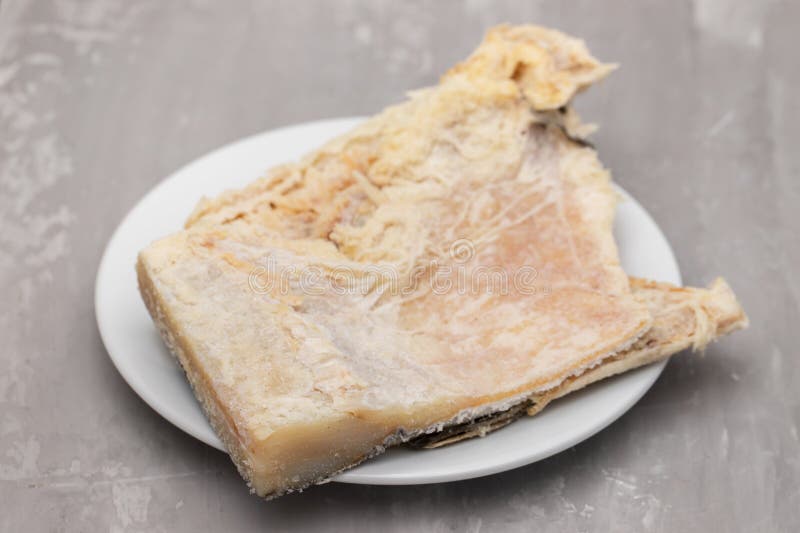 Salted Cod Fish on White Small Dish Stock Image - Image of ocean, wood ...