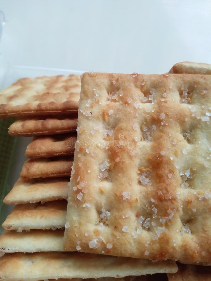 Salted Crackers Arranged in a Stack Displaying Close-Up Texture Stock ...