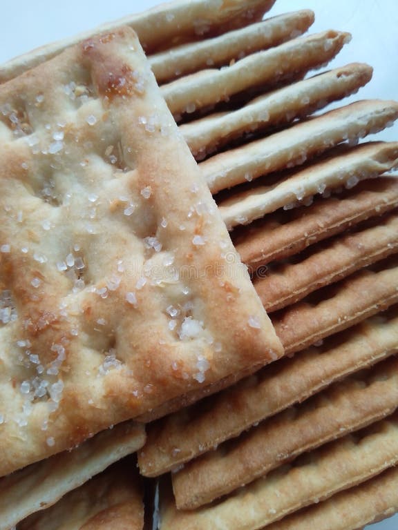 Salted Crackers Arranged in a Stack Displaying Close-Up Texture Stock ...