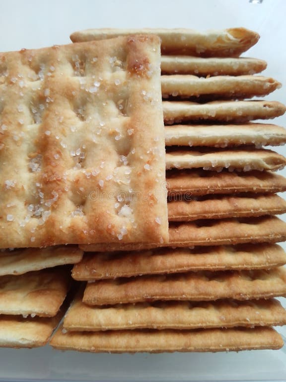 Salted Crackers Arranged in a Stack Displaying Close-Up Texture Stock ...