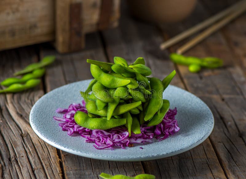 Edamame Served on Steamed White Rice in a Cast Iron Pot, Captured in 4K ...