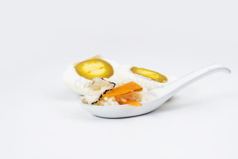 Salted egg with a spoon stock image. Image of congee - 46471369