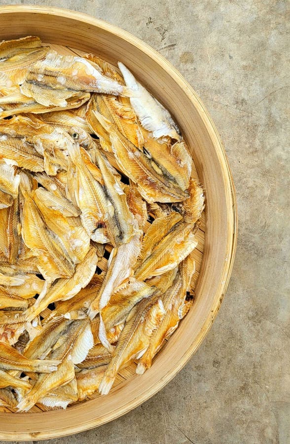 Salted Fish Crackers on a Wooden Tray Stock Photo - Image of backdrop, fried: 338834794