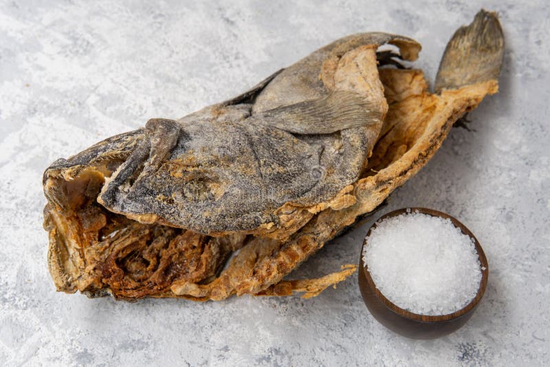 Salted Cod with Sea Salt on a Light Background Stock Photo - Image of ...