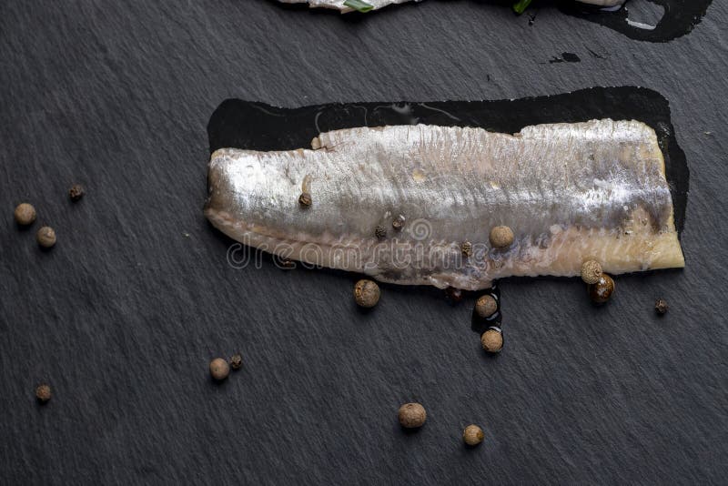 Salted Herring Fillet on the Table Stock Photo - Image of snack, herring: 321498396