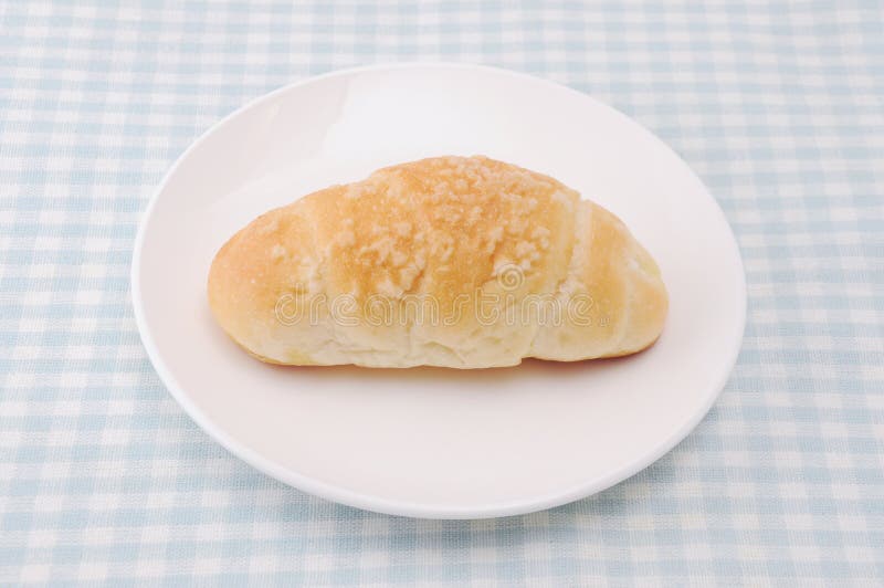 Salty Butter Roll Bread on Plate on Table Stock Photo - Image of crusty ...
