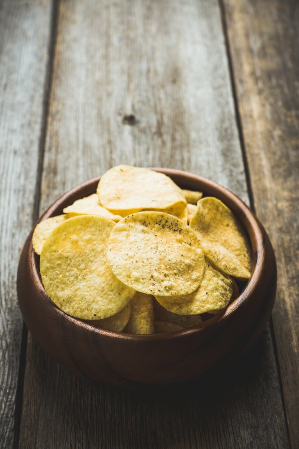 Salty Chips on the Rustic Background Stock Image - Image of focus ...