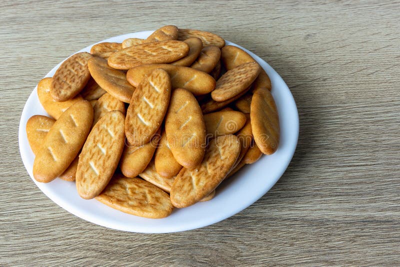 Salty Crackers on a Senior Batonio Plate on the Table Stock Photo ...