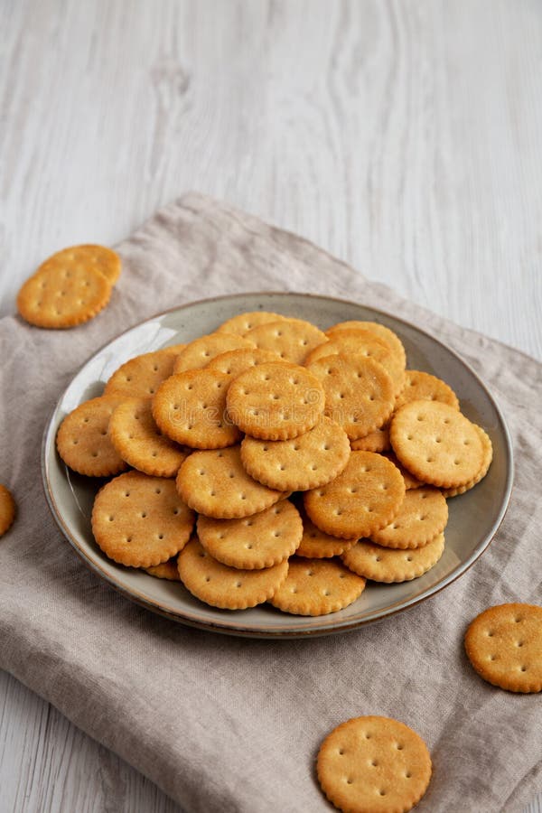 Salty Round Crackers on a Plate, Side View Stock Photo - Image of salty ...