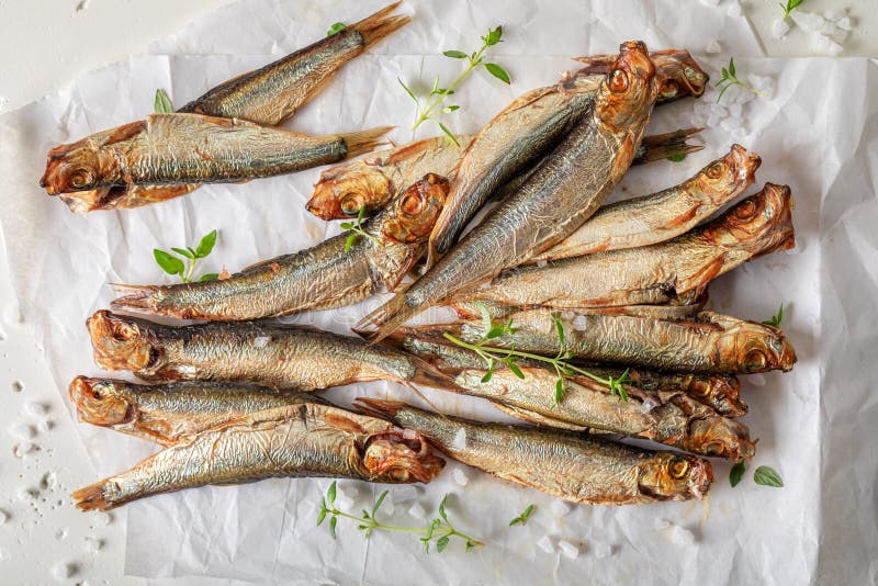 Salty Smoked Sprats As Appetizer by the Sea Stock Photo - Image of ...