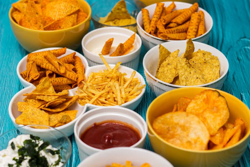 Salty Snacks Assortment and Dipping Sauce Stock Photo - Image of ...
