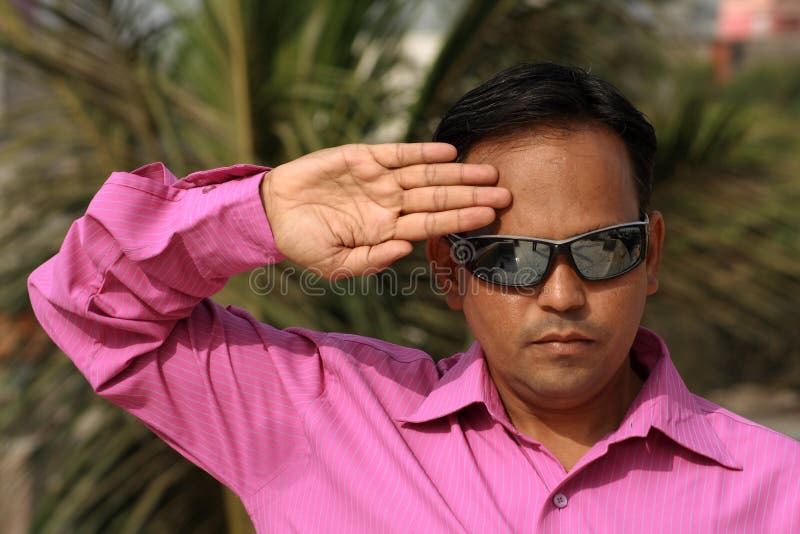 Saluting with right hand stock image. Image of dark, expression - 5129961