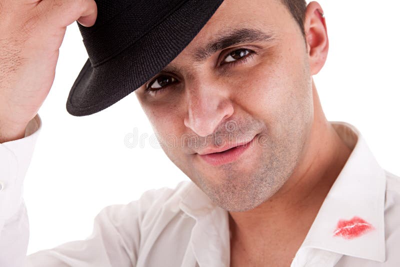 Uomo Seducente Che Saluta Con Il Cappello Immagine Stock - Immagine di ...