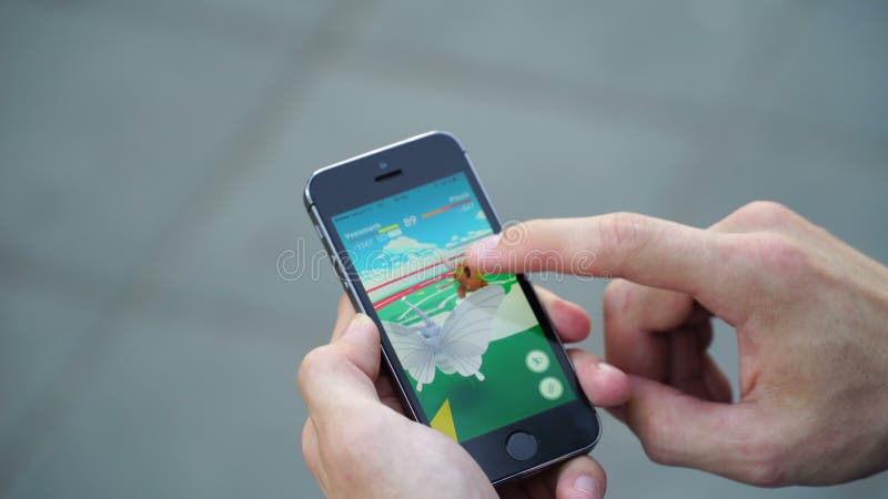 Samara, Russia - August 6, 2016: Man Playing Pokemon Go on His ...