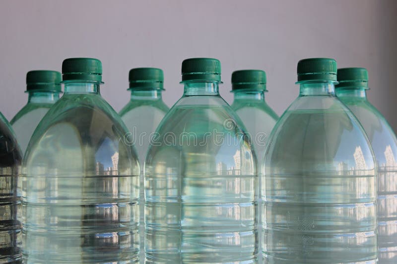 Same Plastic Bottles with Clean Water on White Background Isolated ...