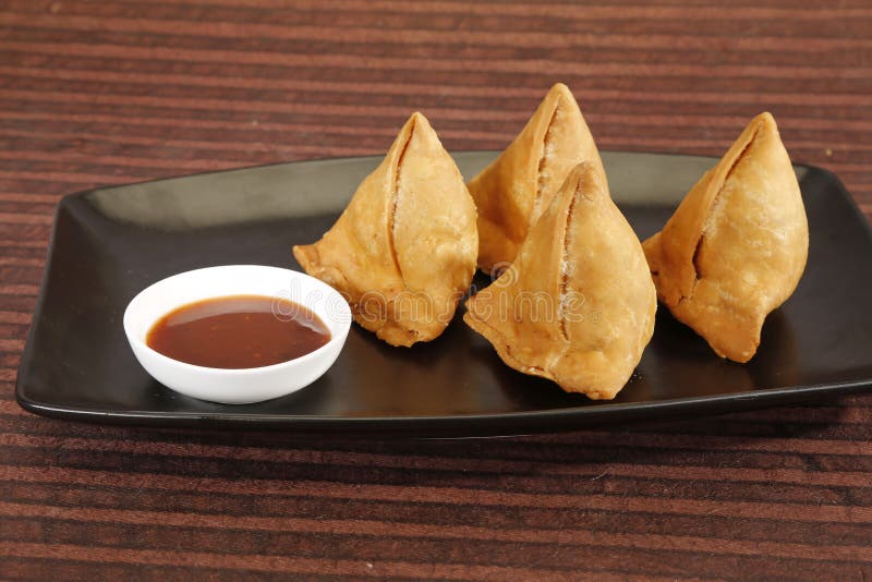 Samosa - Deep Fried Patty Filled with Potato & Vegetables Stock Image ...