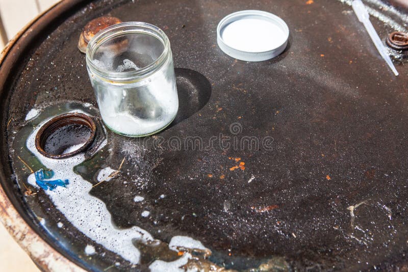 Sample Collection from Steel Drum Stock Photo - Image of liquid ...