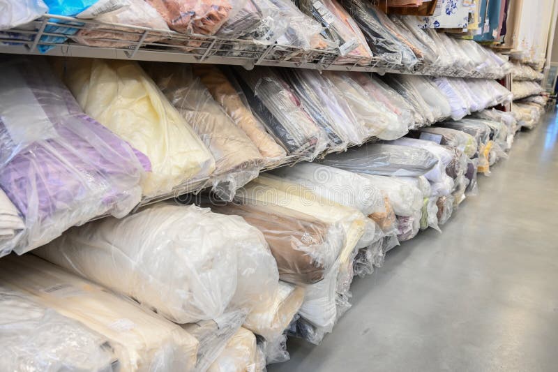 Sample Fabric Rolls in Warehouse. Rolls of Fabric are Packed in Plastic ...