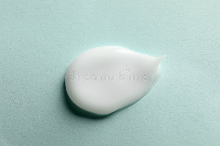 Sample of Face Cream on Light Blue Background, Top View Stock Photo ...