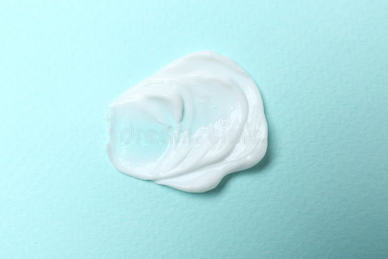 Sample of Hand Cream on Turquoise Background, Top View Stock Photo ...