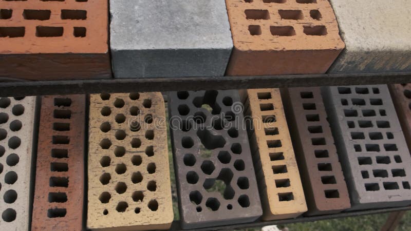 Samples of Bricks Differ in Shape and Color Displayed in a Row at the ...